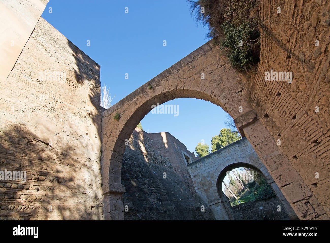 Alhambra islamic moorish palace architecture details and blue sky in ...