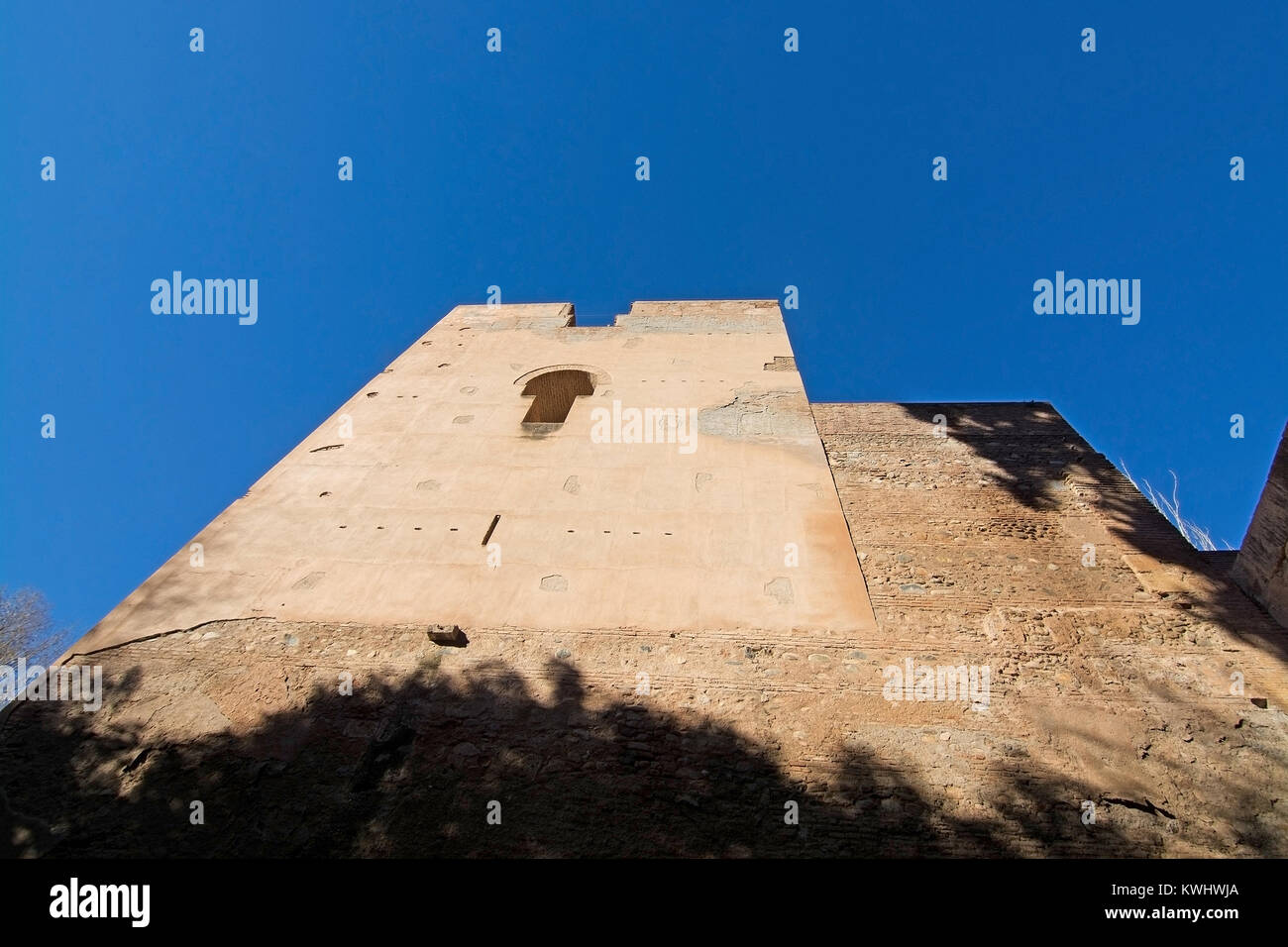 Alhambra islamic moorish palace architecture details and blue sky in ...