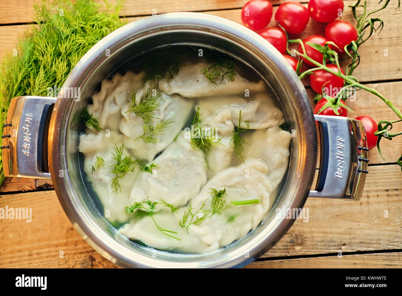 Boiled dumplings with parsley Stock Photo - Alamy