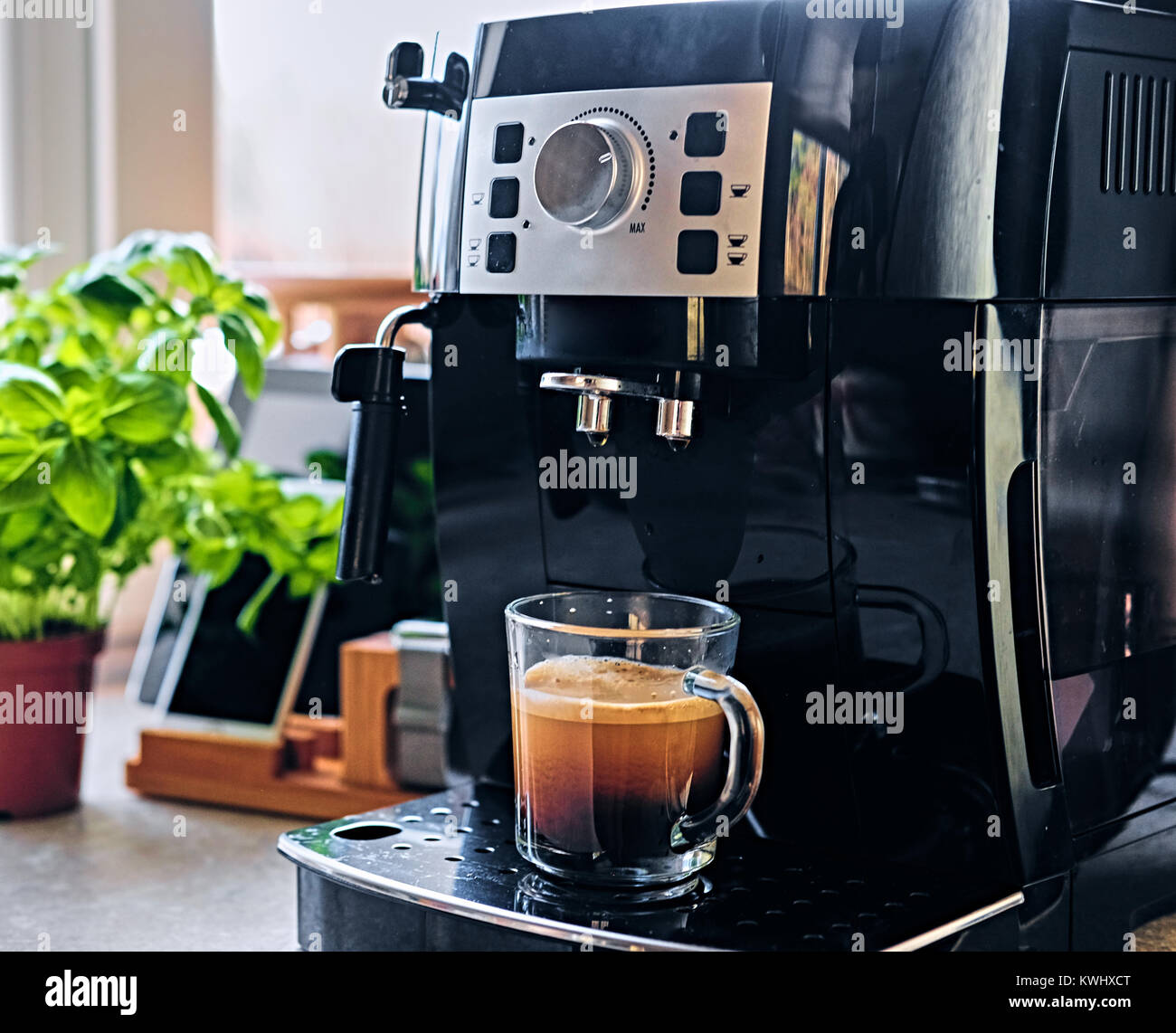 Professional coffee machine for home use. At the kitchen Stock Photo ...
