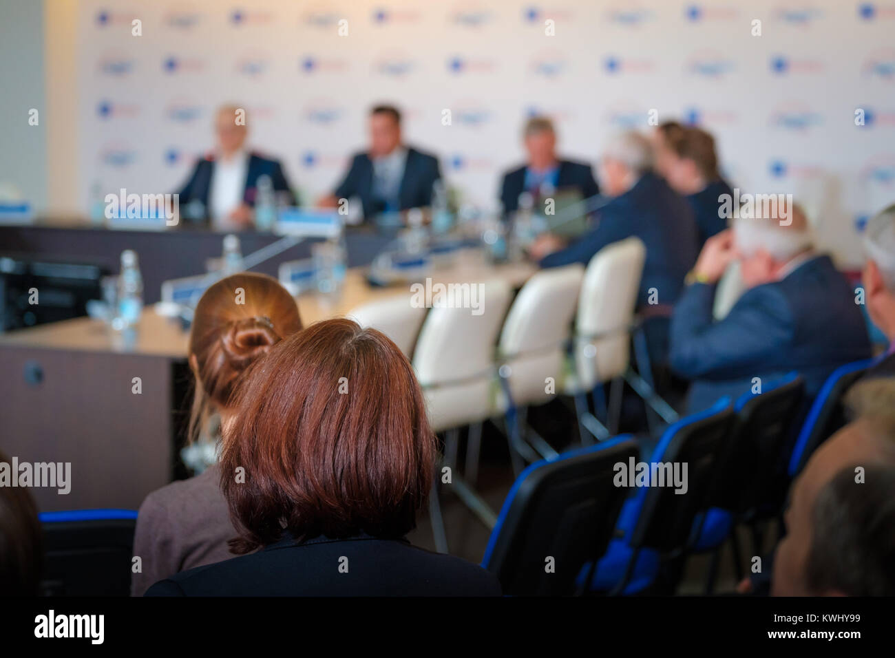 People attend business conference in congress hall Stock Photo - Alamy