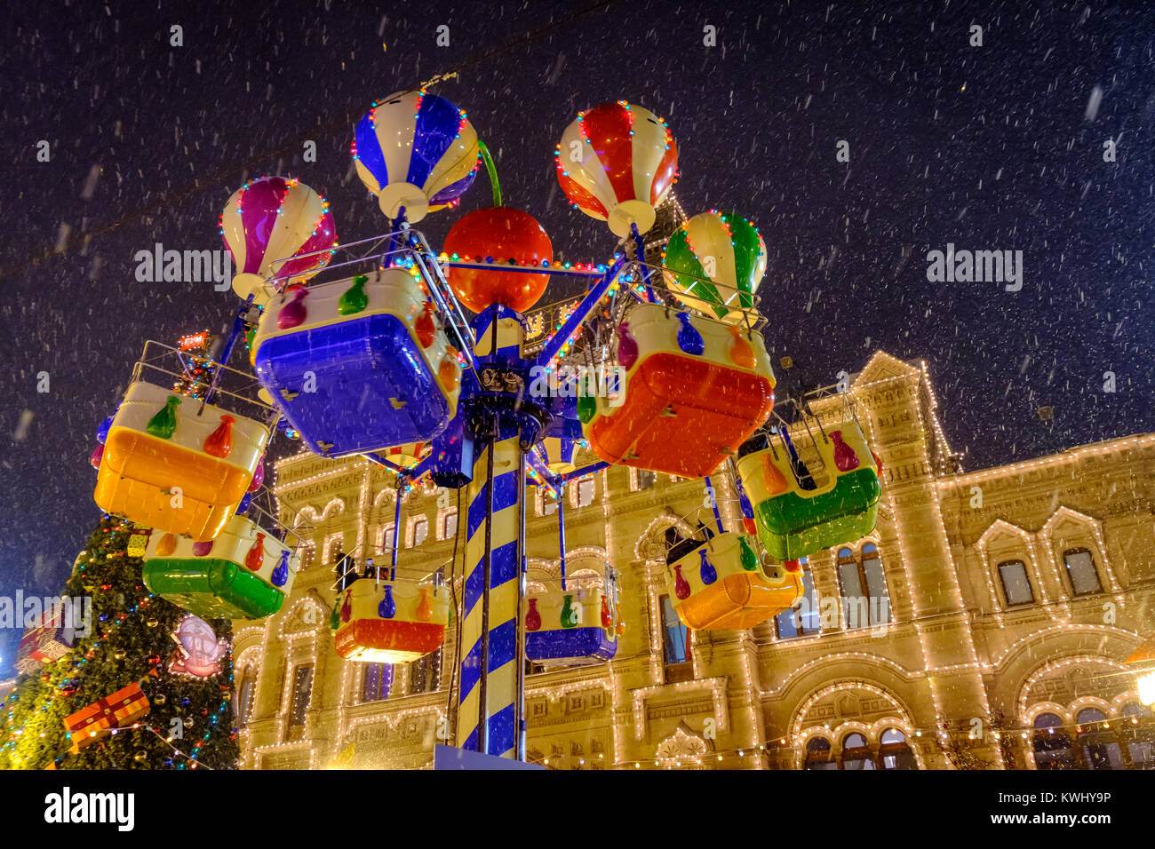 Carousel at christmas fair Stock Photo - Alamy