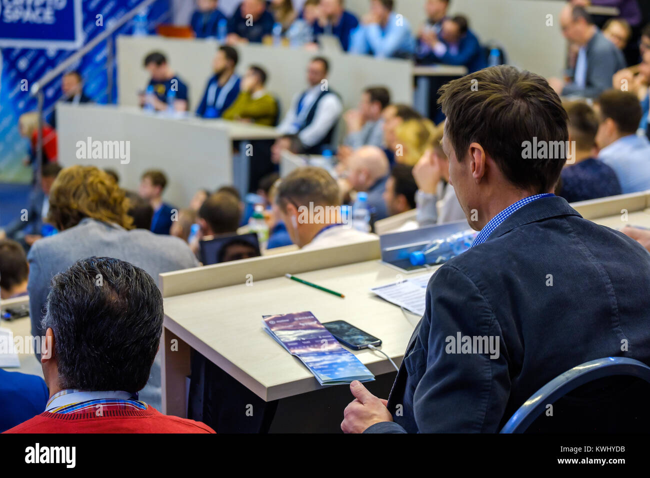 People attend business conference in congress hall Stock Photo - Alamy