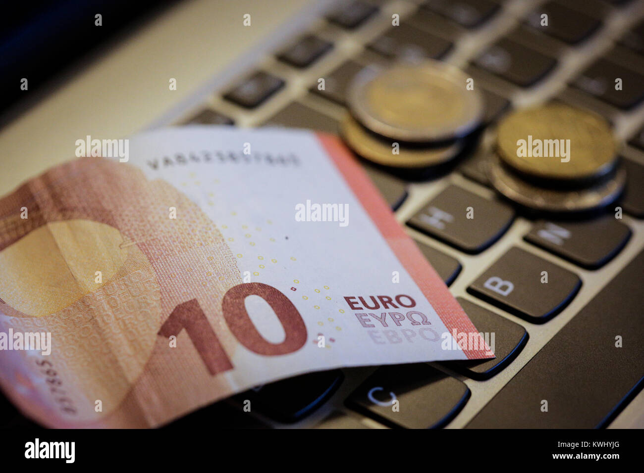 Money computer keyboard bills hi-res stock photography and images - Alamy