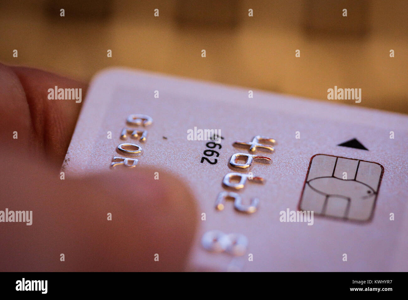 Closeup of man holding credit card Stock Photo - Alamy