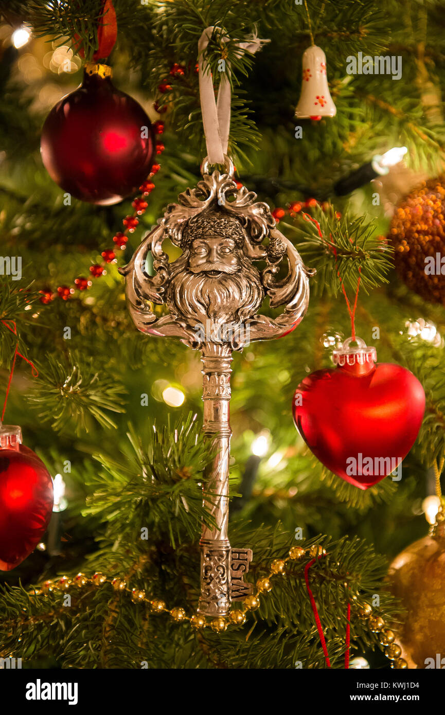 Santa's magic key hangs on the Christmas Tree waiting to be put on the ...