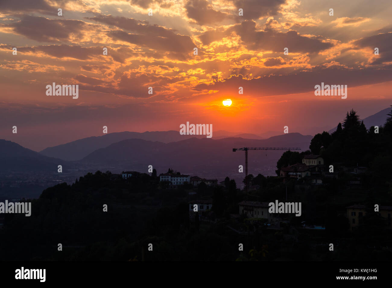 A beautiful sun over the northern parts of Italy Stock Photo - Alamy
