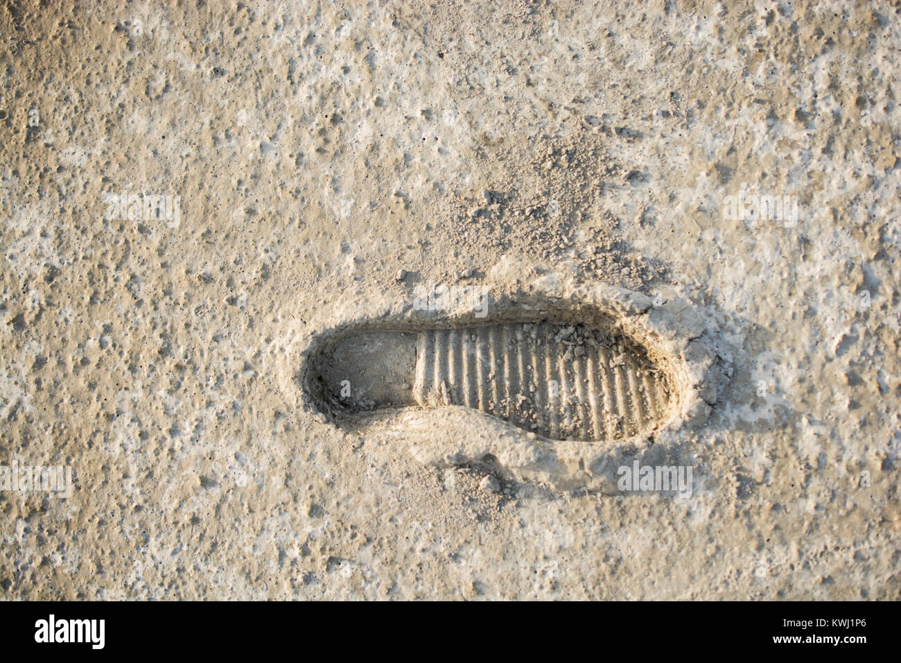 Footstep pattern seen on a concrete background Stock Photo - Alamy