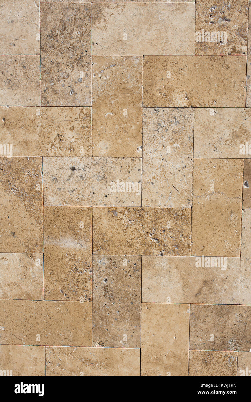 Decorative cubic stone wall as background texture Stock Photo - Alamy