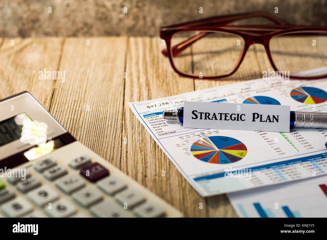 Strategic Plan motivational concept with charts and graphs and ...