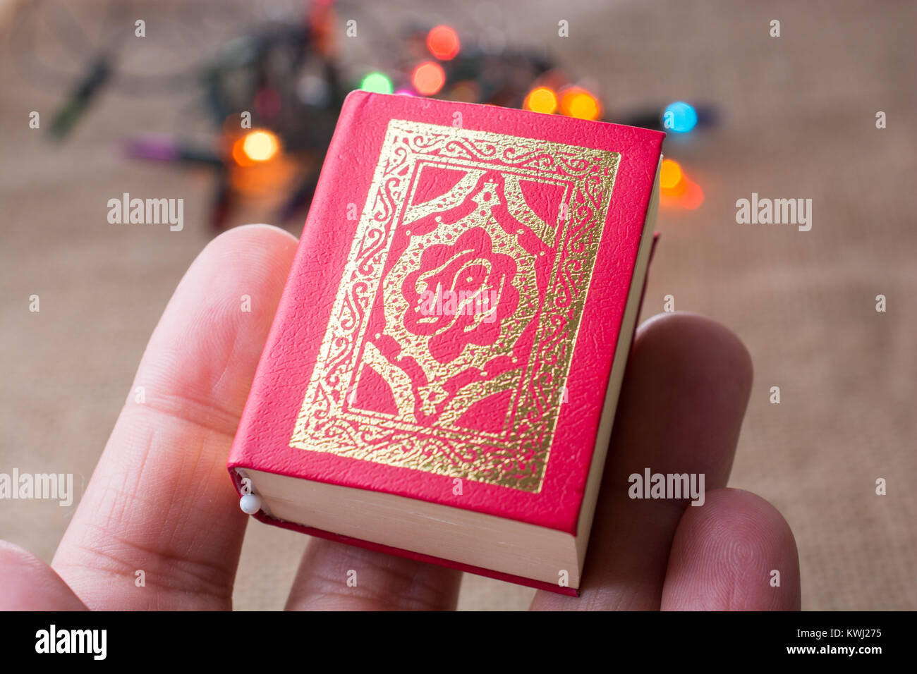 Islamic Holy Book Quran with lights behind Stock Photo - Alamy