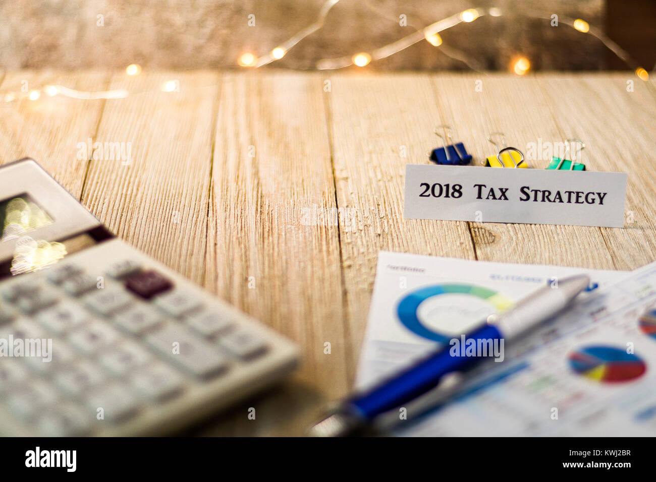 Tax Strategy Plan for 2018 motivational concept with charts and graphs ...