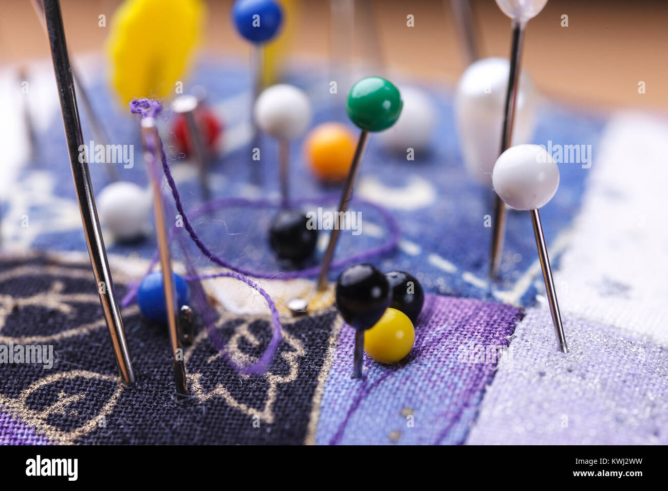 A conceptual image of pins and needles sticking in a pin cushion Stock ...