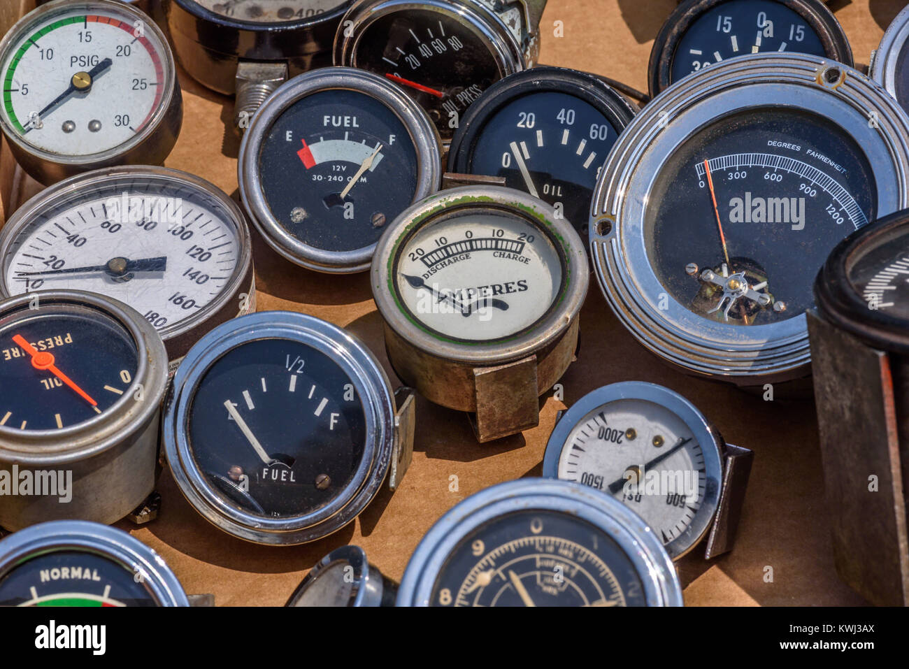 collection of old industrial machine dials and gauges with logos and ...