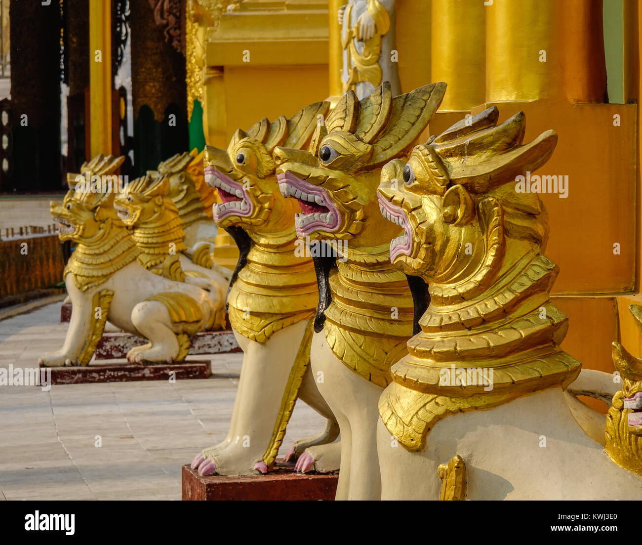 Guardian Lion statues at Shwedagon Pagoda in Yangon, Myanmar Stock ...