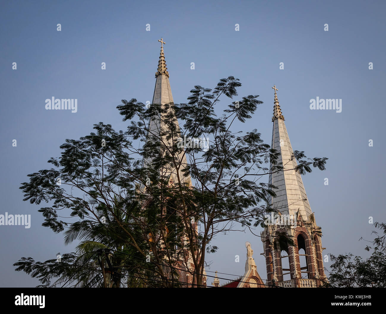 Top of ancient church with trees in Yangon, Myanmar Stock Photo - Alamy
