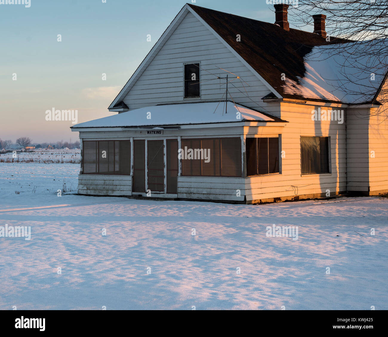 Winter scene of historic farmhouse in late afternoon, Middleton, Idaho ...