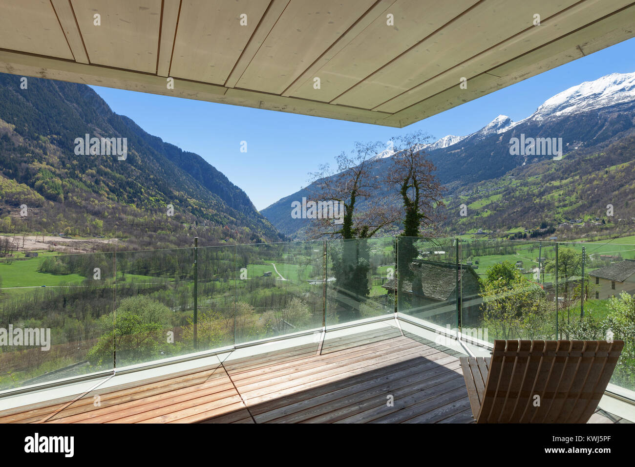 Terrace of a modern mountain house, panoramic view Stock Photo - Alamy