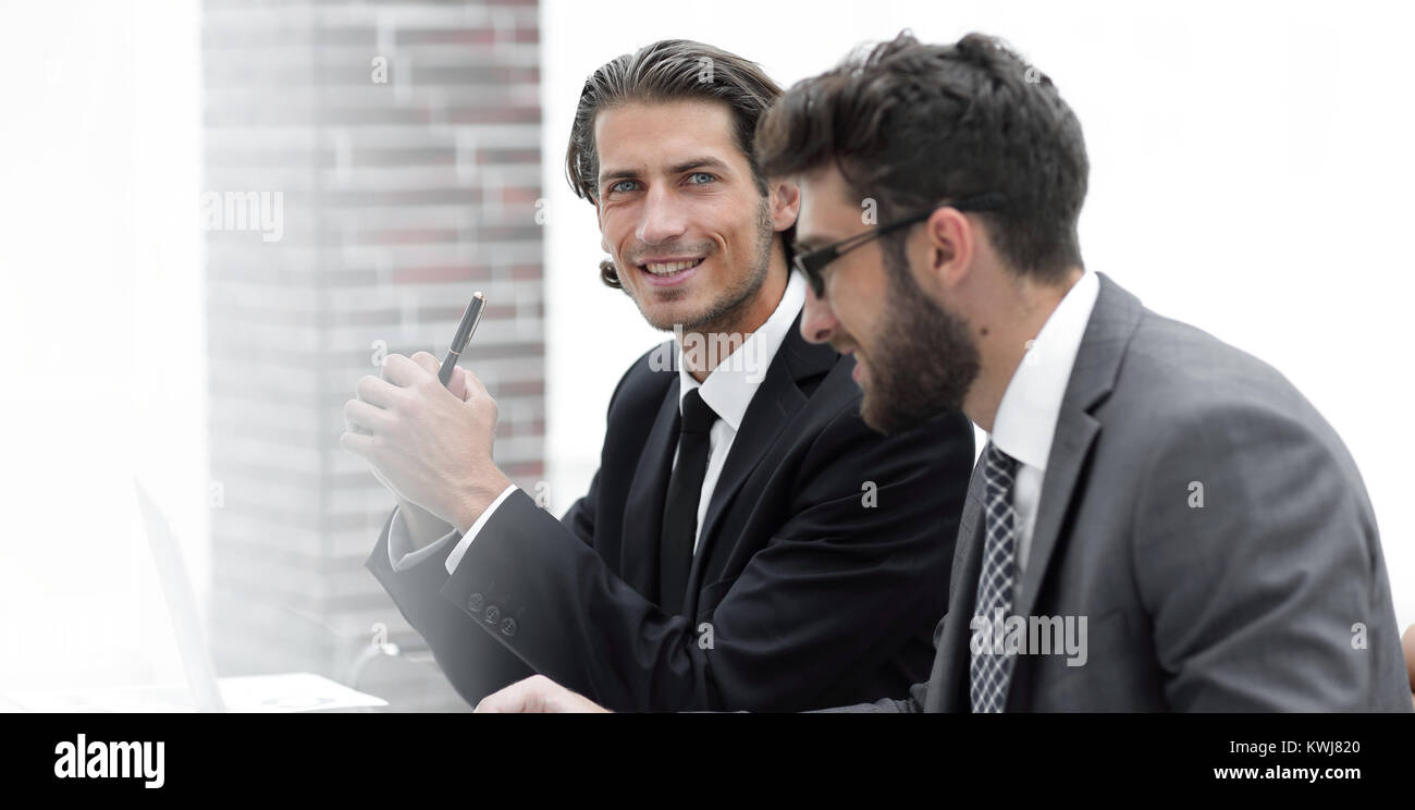 two clerks working at the Desk Stock Photo - Alamy
