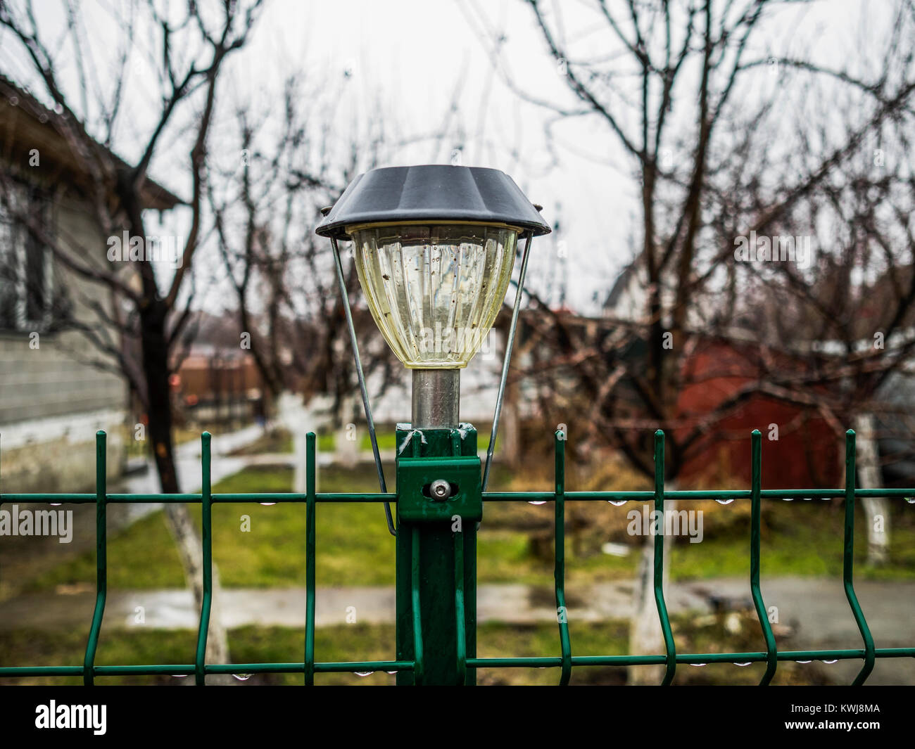 LED flashlight on the fence of a private house site Stock Photo - Alamy