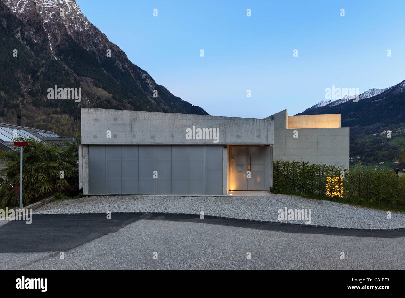 Architecture, entrance of a modern house, evening in mountain Stock ...
