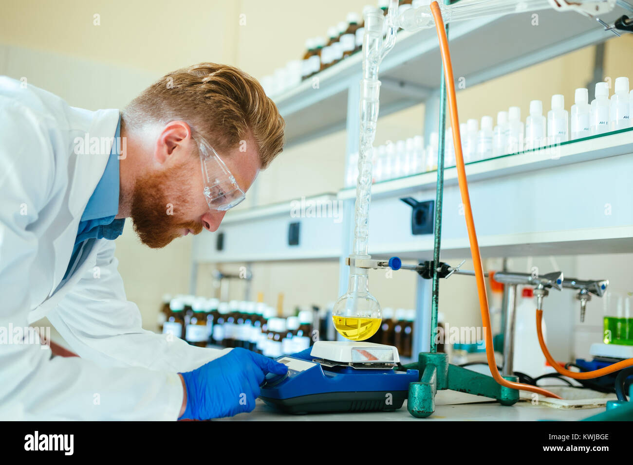 Male student of chemistry working in laboratory Stock Photo - Alamy