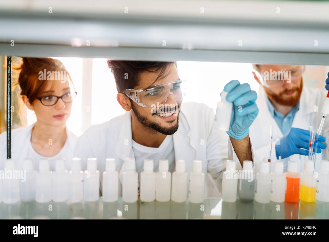 Young students of chemistry working in laboratory Stock Photo - Alamy