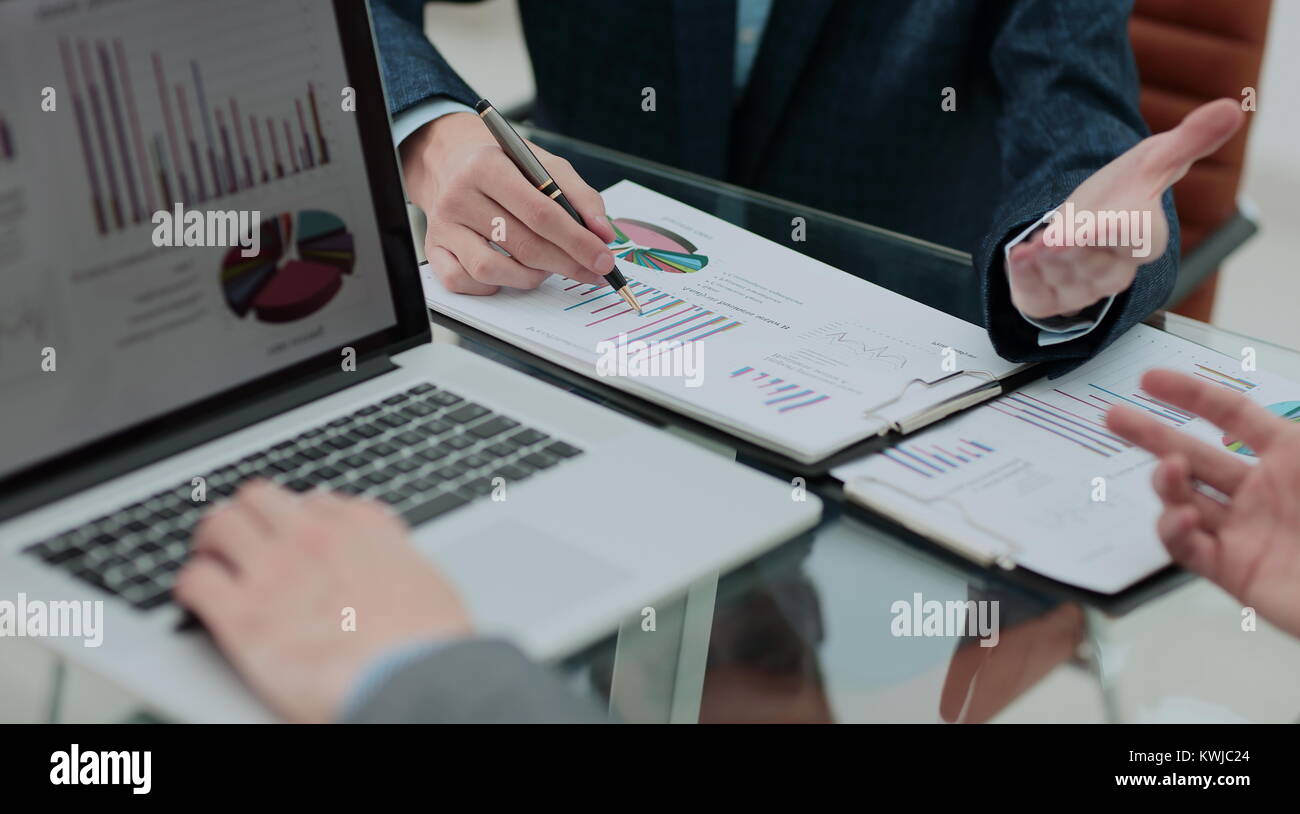 Group of business people busy discussing financial matter during Stock ...
