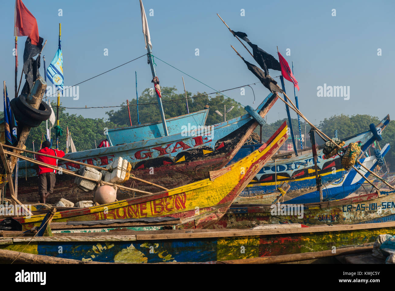 Wooden fishing boats line up on the beach, Senya Beraku, Gold Coast ...