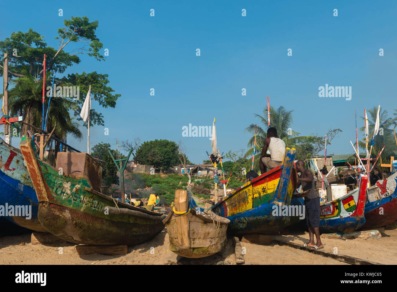 Wooden fishing boats line up on the beach, Senya Beraku, Gold Coast ...