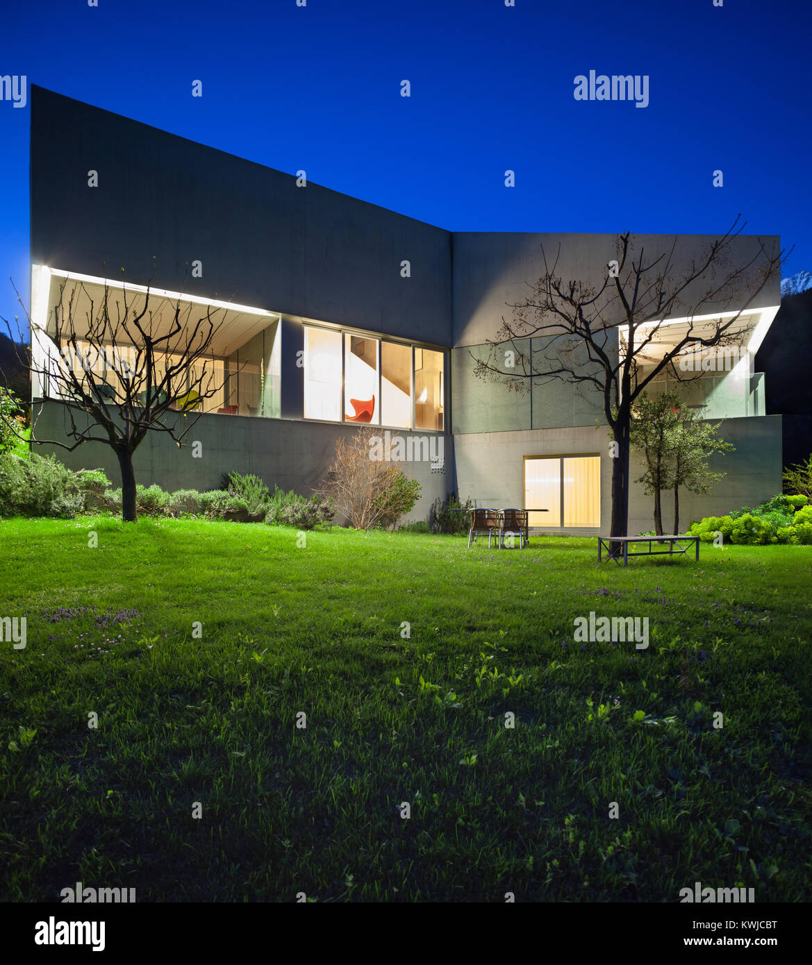 Architecture modern design, concrete house, night scene Stock Photo - Alamy