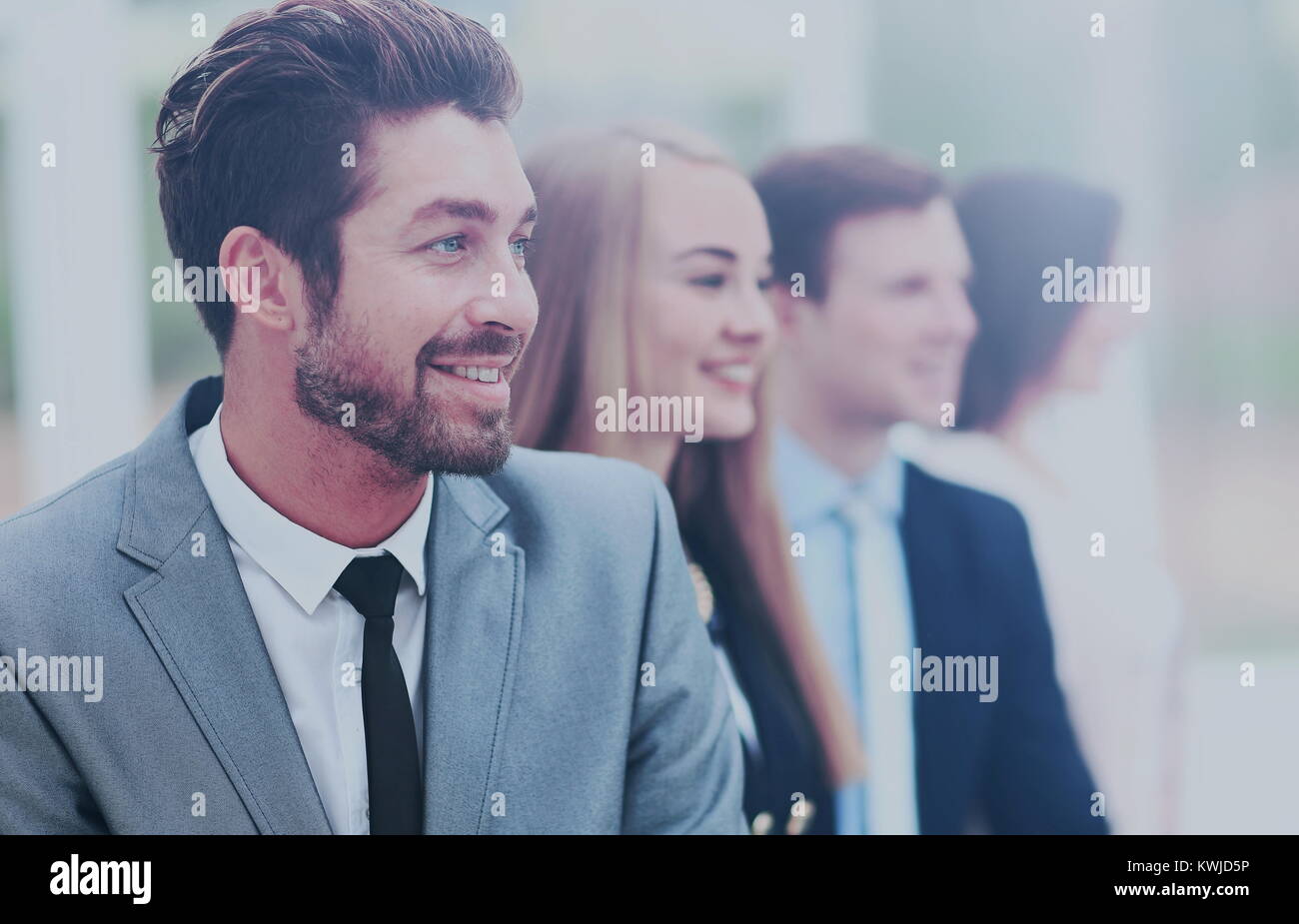 group of business people smiling in an office Stock Photo - Alamy