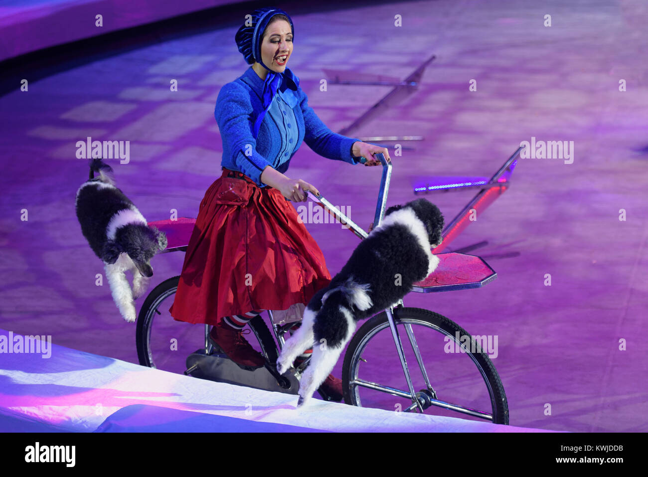 Victoria Akimova as Gerda with trained dogs in the circus show Snow ...