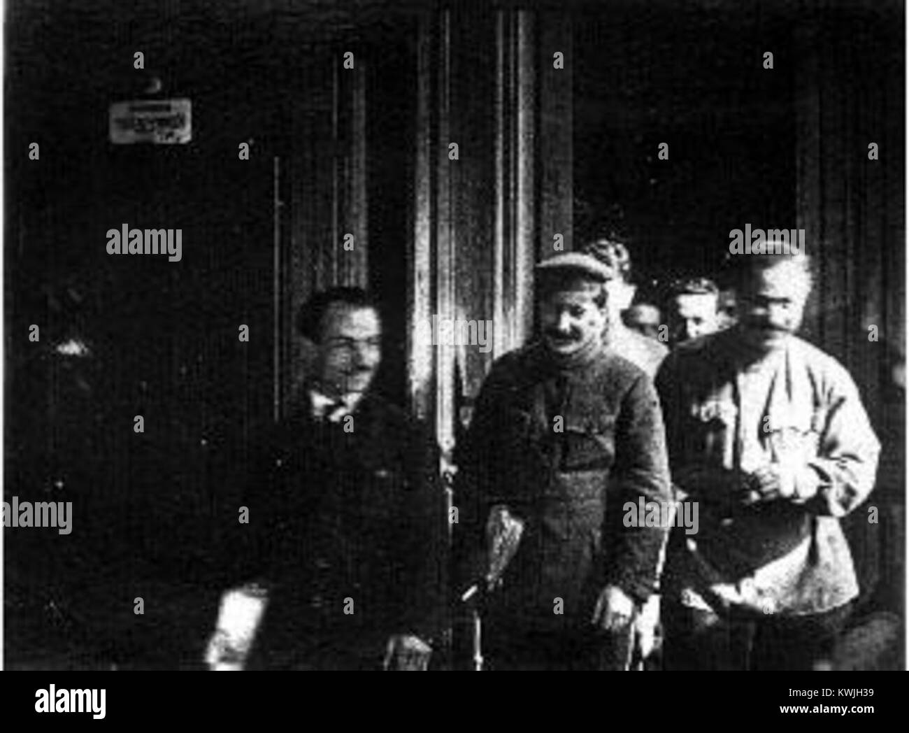 A historical photograph of Joseph Stalin with delegates at the 12th ...