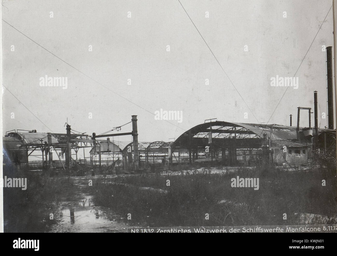 This image depicts the destroyed rolling mill of the Monfalcone ...