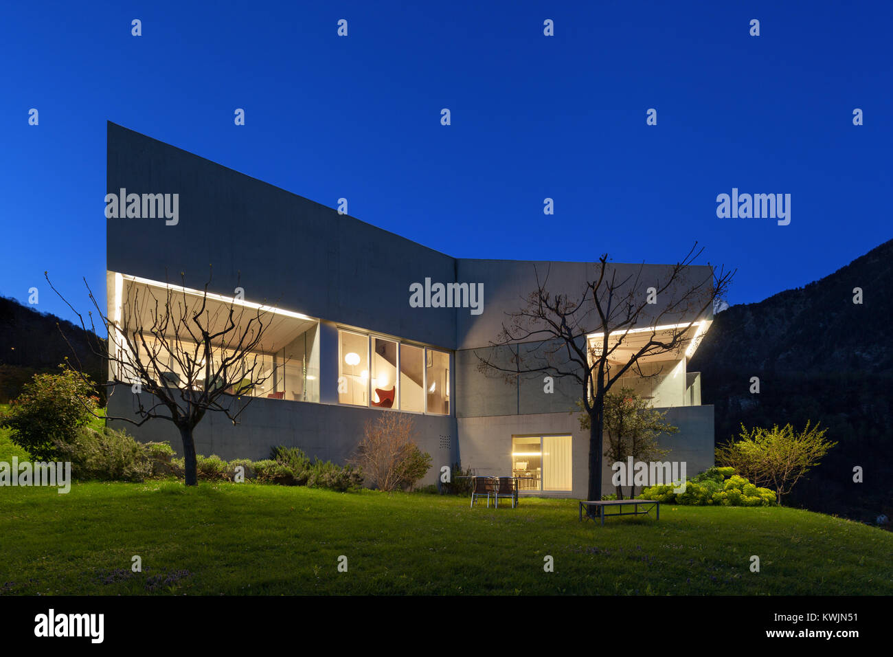 Architecture modern design, concrete house, night scene Stock Photo - Alamy