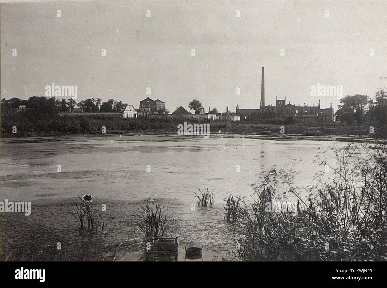 The image shows a destroyed sugar factory in Strzyżów, Poland. The ...