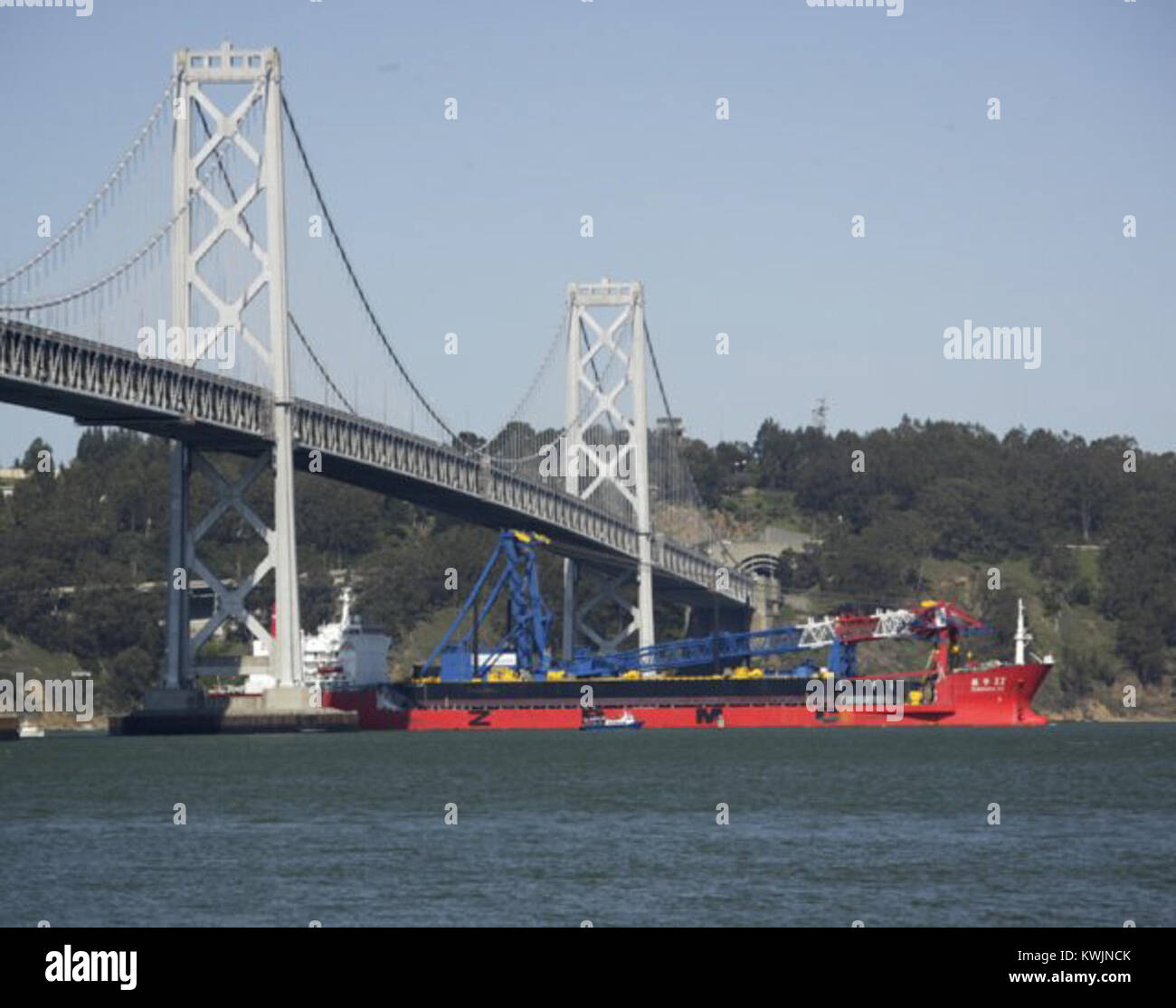 A photograph showing the Zhenhua 22 crane alongside the Left Coast ...