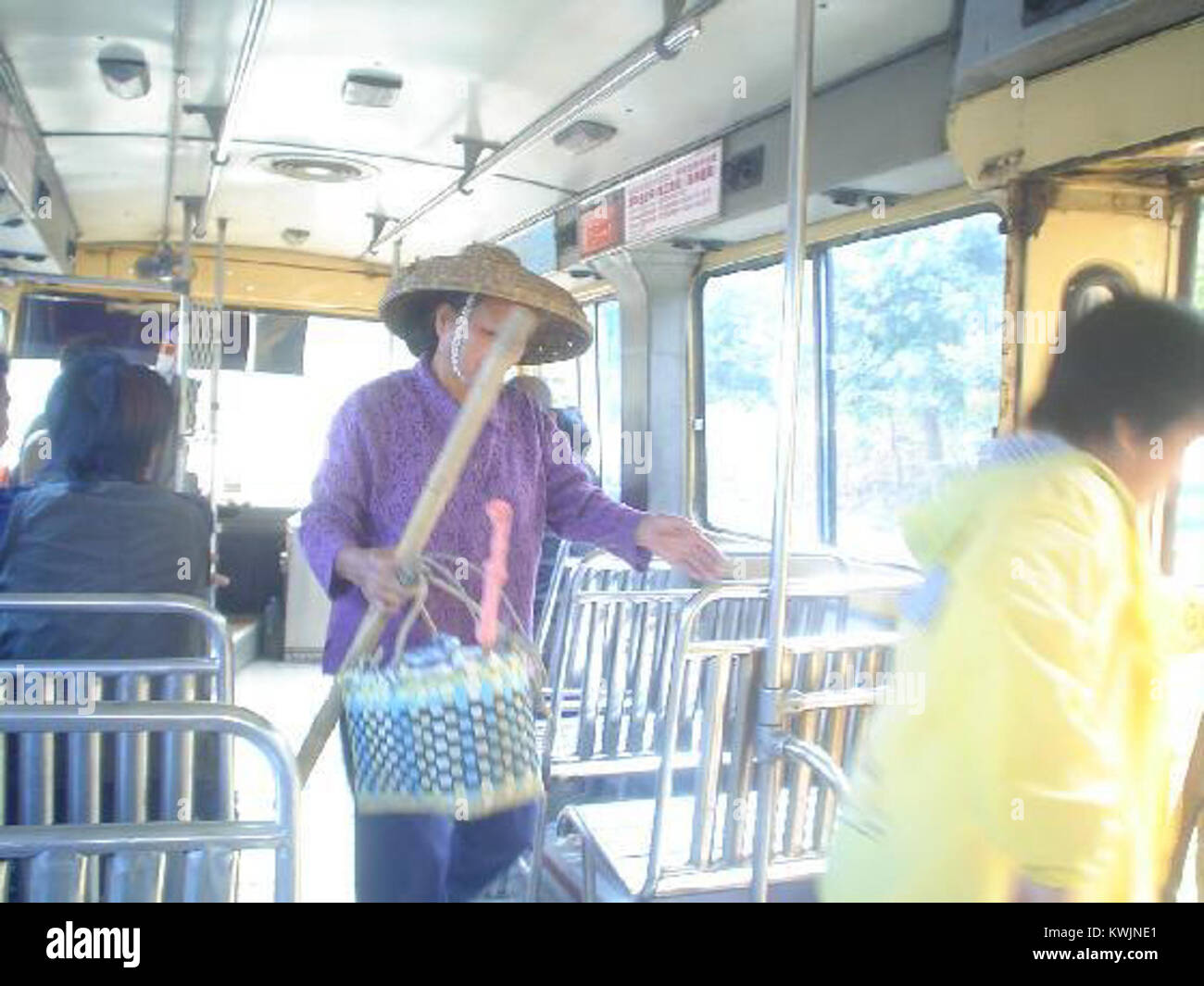 This image shows the interior of a bus in Zhuhai, China. It reflects ...