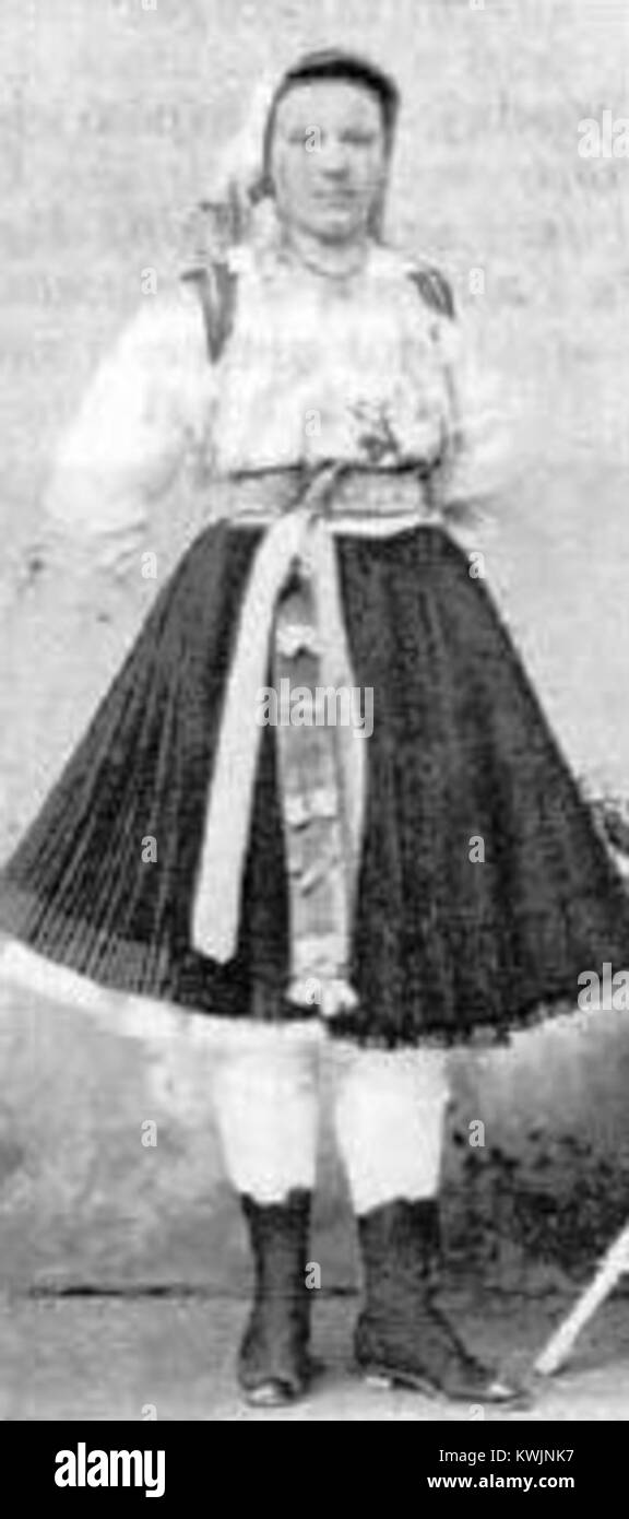 A photograph depicts the traditional folk costume (narodna noša) of the ...