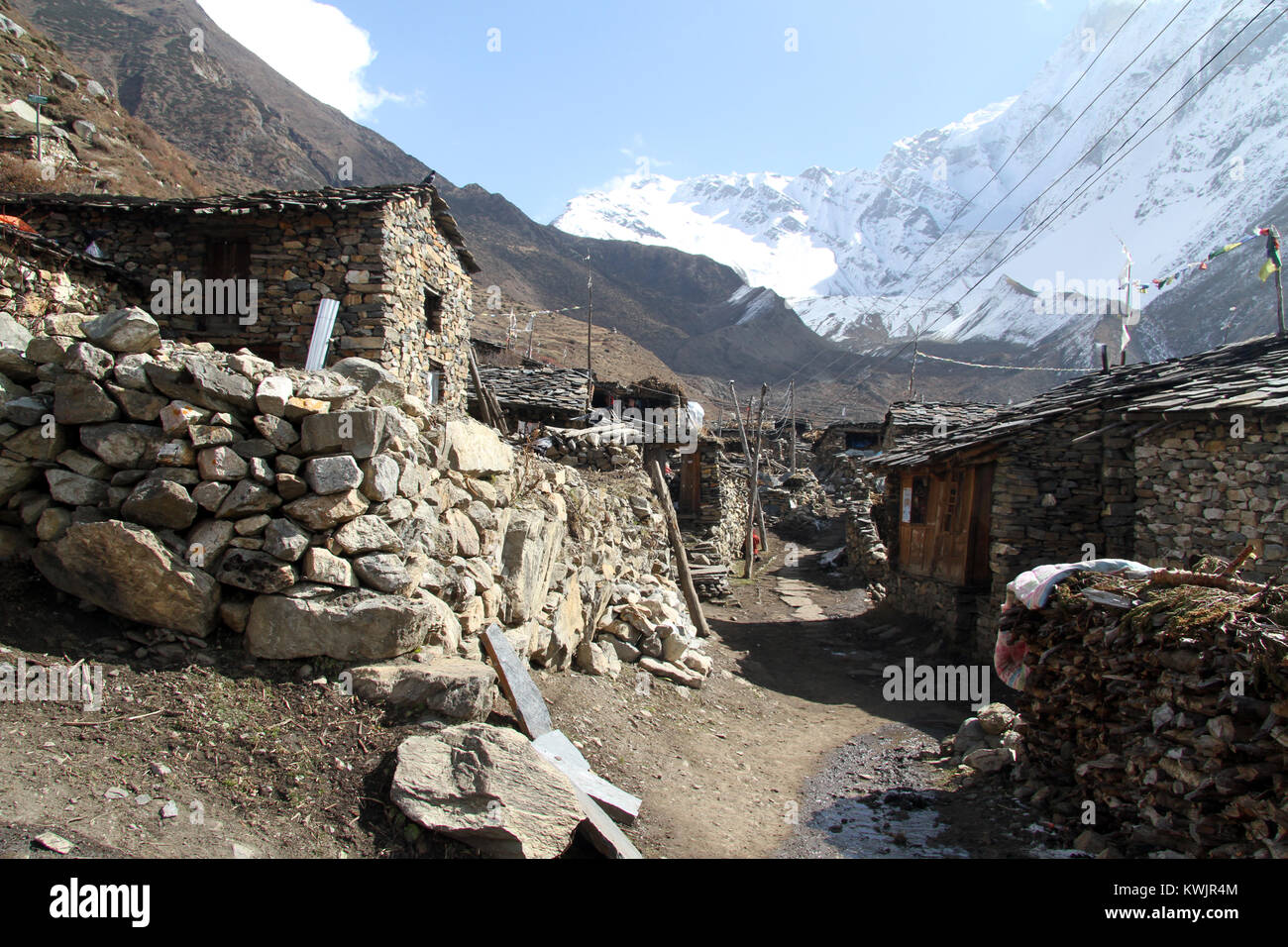 Stone houses on the street in Samdo in Nepal Stock Photo - Alamy