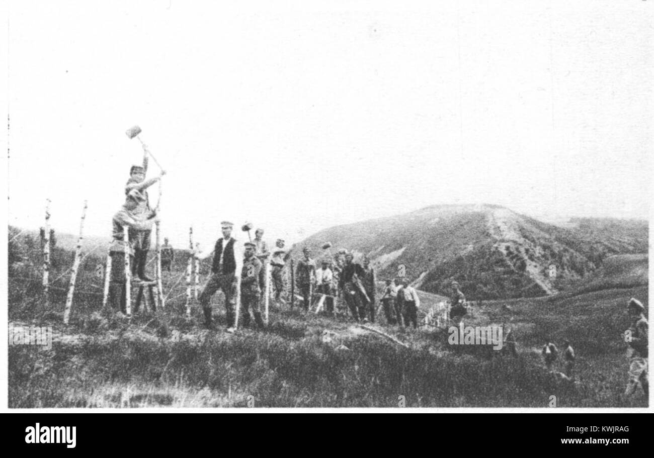 An image from 1915 showing the setup of obstacles under tree branches ...
