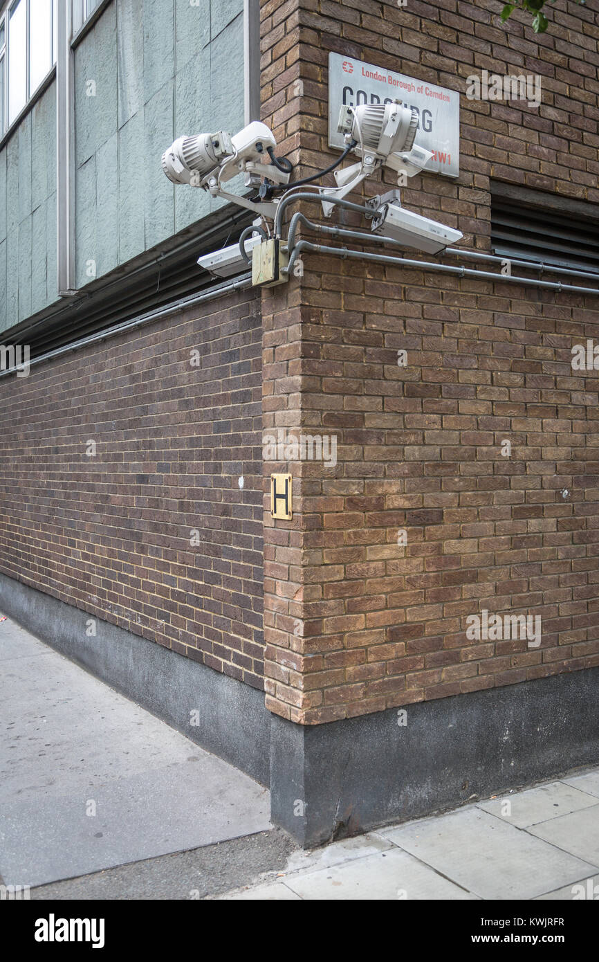 Security cameras on the corner of a building Stock Photo - Alamy