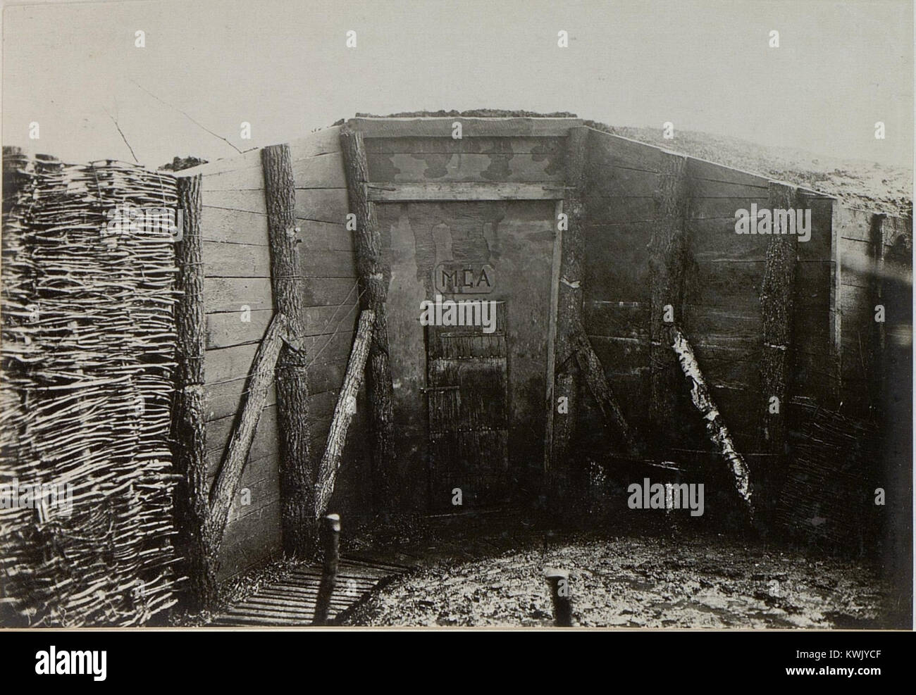 A World War I photograph showing the entrance to a bombproof machine ...