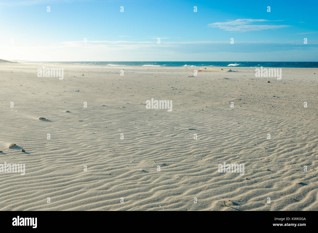 Wavy sand on the beach due to strong wind Stock Photo - Alamy