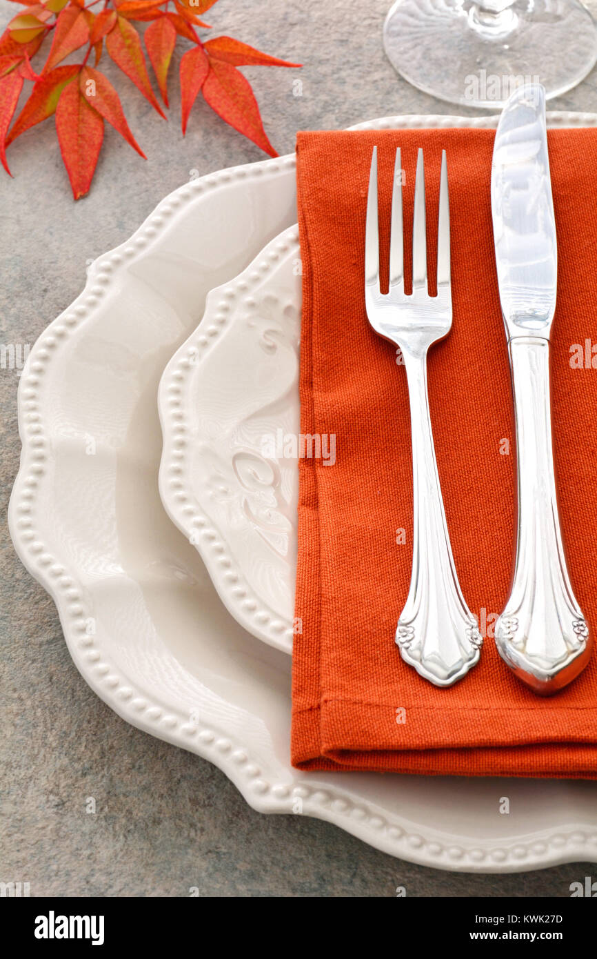 Rustic table setting with warm tones in vertical format shot in natural ...