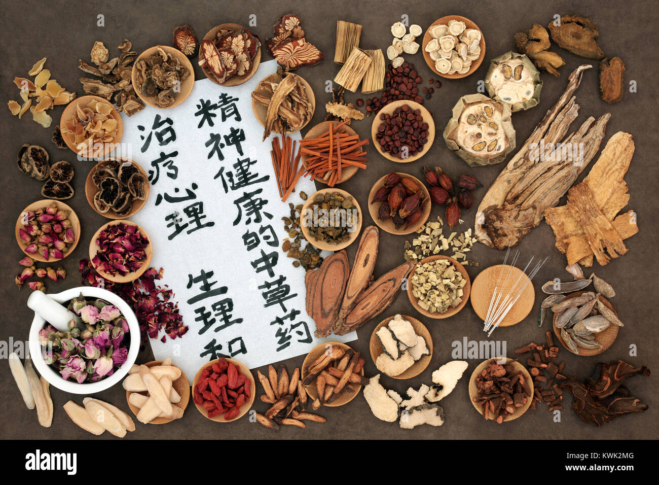 Chinese herbs used in herbal medicine with acupuncture needles and ...