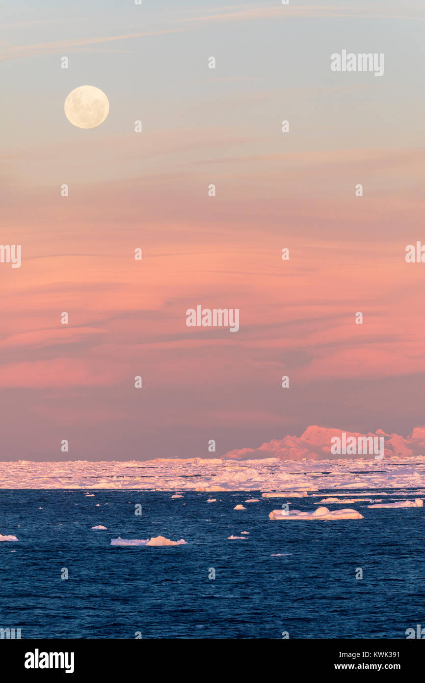 Full moon rising over Antarctica landscape; Rongé Island; Arctowski ...