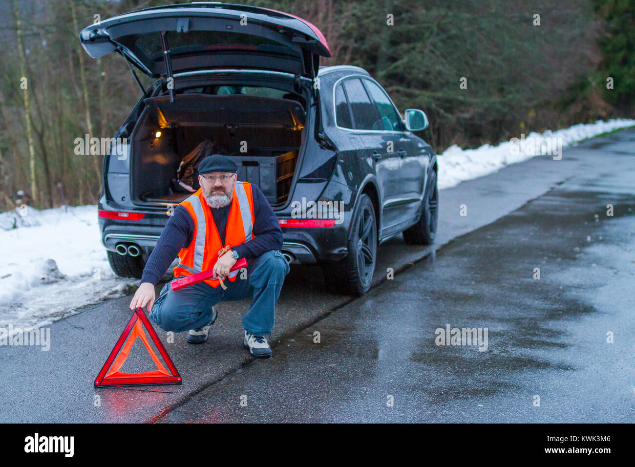 A man has a car breakdown on a country road Stock Photo - Alamy