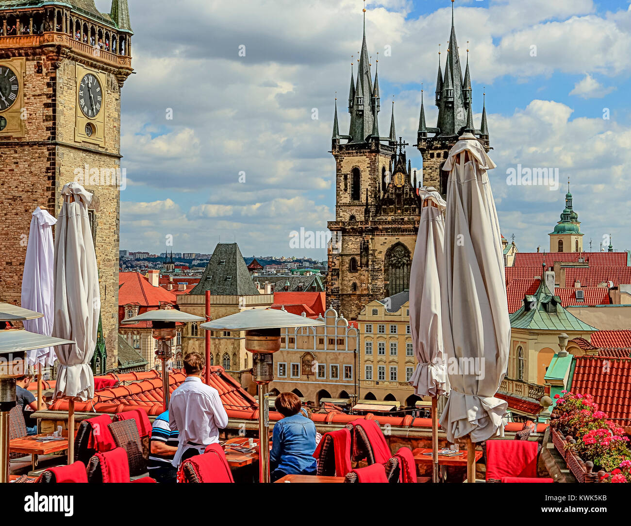 View of the skyline of the old town Prague from a roofrop restaurant ...
